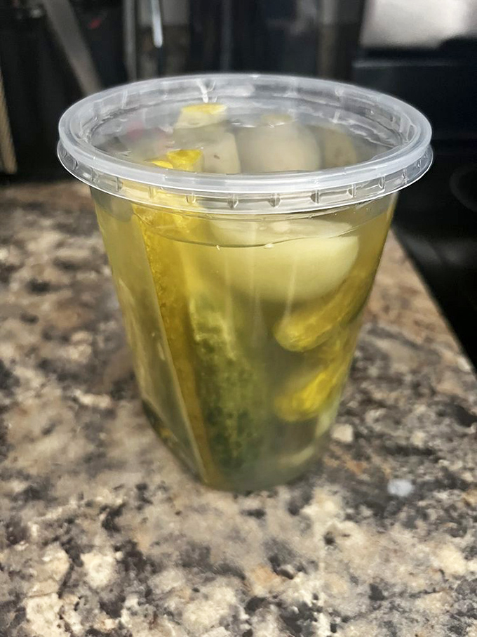 These aren't just pickles&mdash;they're the restaurant's namesake for a reason. Crunchy, garlicky proof that sometimes the simplest things matter most.