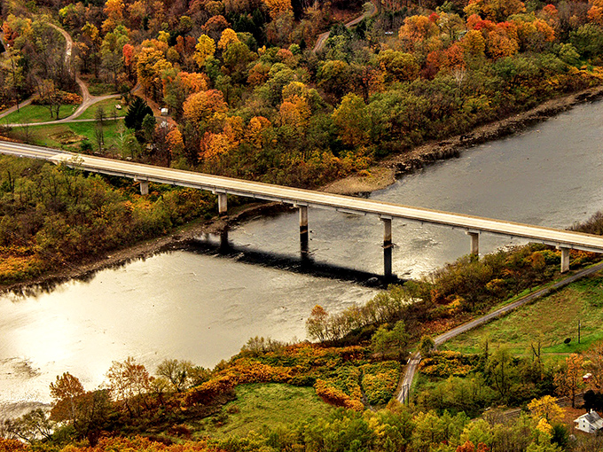 Engineering meets autumn splendor. This bridge connects more than just riverbanks&mdash;it links us to landscapes that restore our sense of wonder.