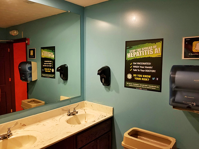 Even the restroom maintains the restaurant's commitment to cleanliness and color, though the hepatitis awareness poster might briefly pause your appetite.