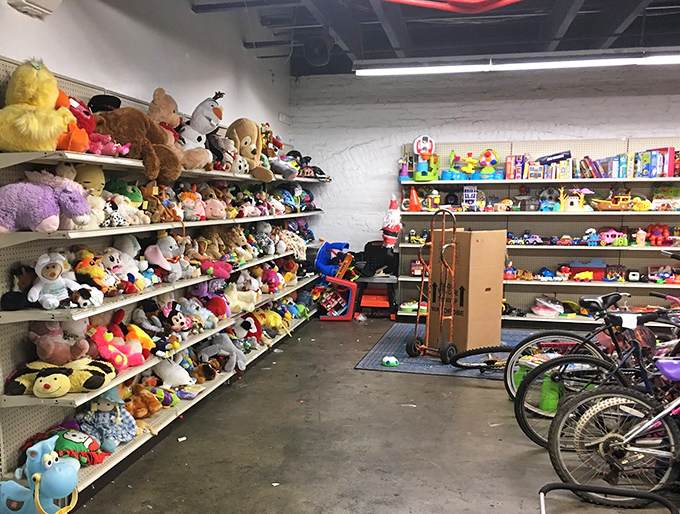 Stuffed animals stand in formation, a plush army of pre-loved companions ready for new hugs and adventures with the next generation.