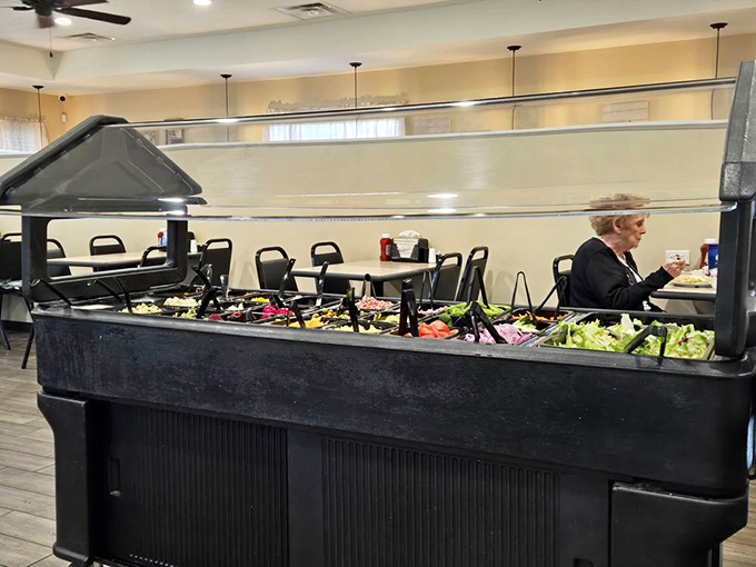 A salad bar that says, "Yes, we have vegetables too," offering a token nod to nutrition before you order that second piece of pie.