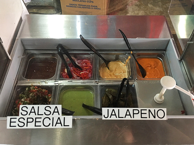 The salsa bar—where heat-seekers find their match and flavor explorers discover new frontiers. Choose your adventure wisely!