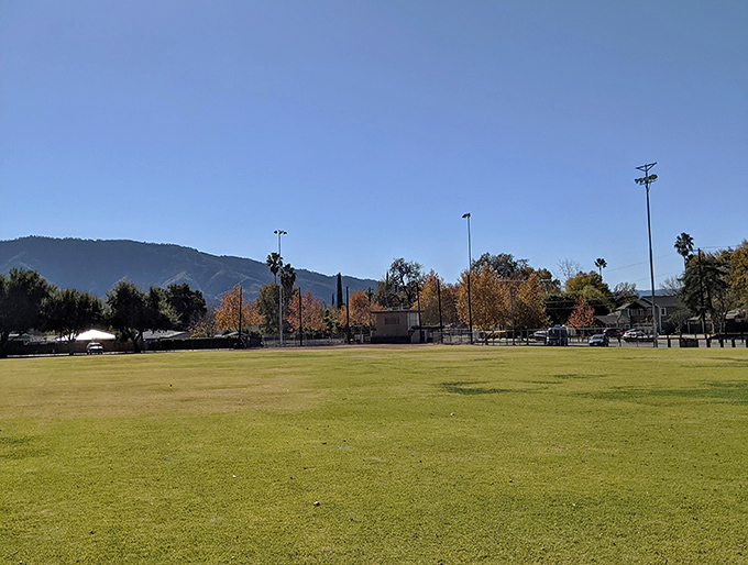 Sarzotti Park's open green space invites impromptu picnics and lazy afternoon naps. The mountains provide nature's perfect backdrop.
