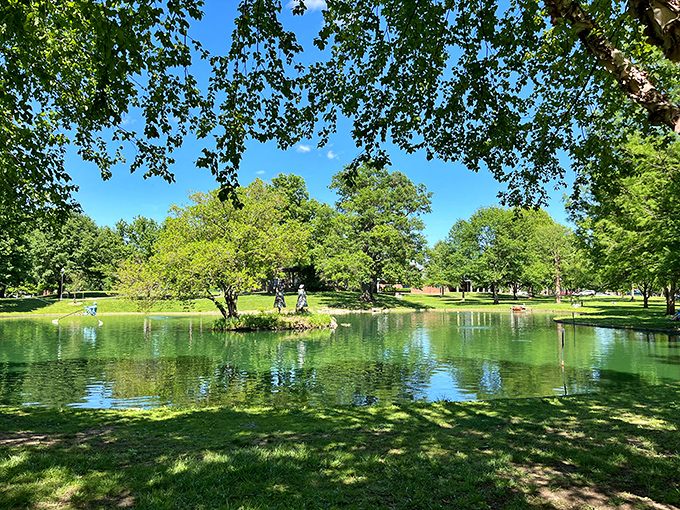 Nature's mirror effect doubles the beauty at Schiller Park. This urban oasis proves that sometimes the best city views include absolutely no buildings at all.