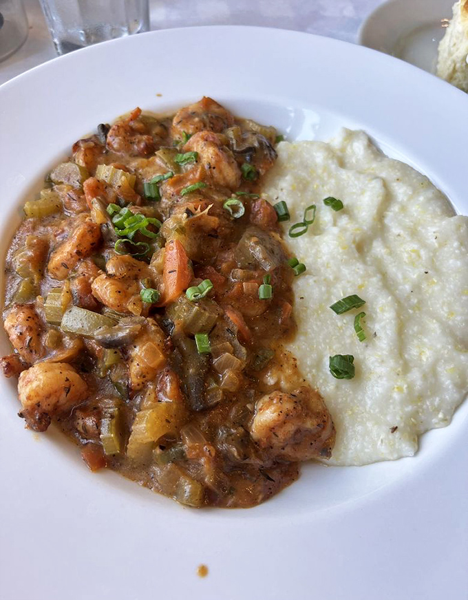 Shrimp and grits so authentic they could make a Cajun grandmother nod in approval while reaching for her own spoon.