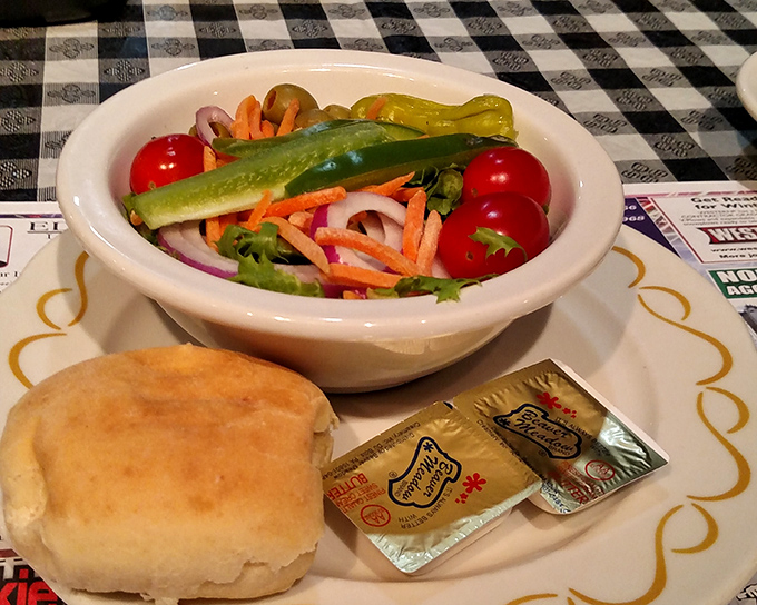 A garden-fresh side salad that brightens the plate. Crisp vegetables, vibrant colors, and a reminder that balance makes everything better.