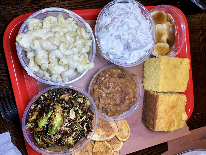 A tray of sides that proves Mike's BBQ understands the supporting cast matters&mdash;from mac and cheese to cornbread, no weak links here.