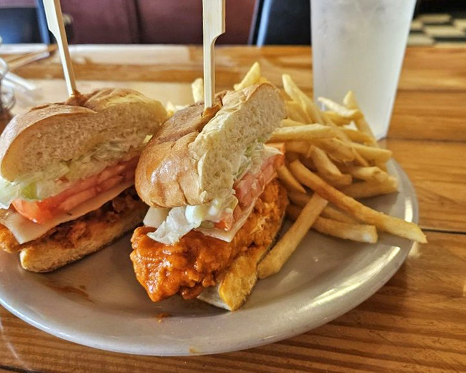 This sandwich isn't just assembled&mdash;it's architected. Crispy chicken nestled between soft bread with fries standing by for moral support.