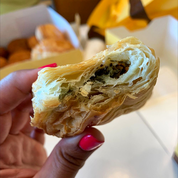This pastry reveals its flaky layers like a good novel&mdash;each bite unfolding a new dimension of buttery, savory storytelling.