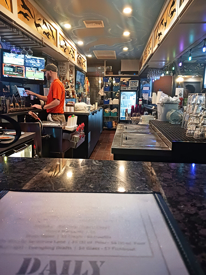 In the culinary engine room, dedicated staff orchestrate the seafood symphony that keeps locals and visitors returning for encores.