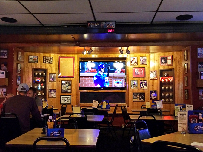 The sports shrine where wood-paneled walls display St. Louis pride and cold beer flows while fans collectively hold their breath during close plays.
