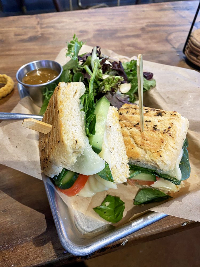 A veggie sandwich that makes you forget you're eating healthy, served with a side salad that's definitely not an afterthought.