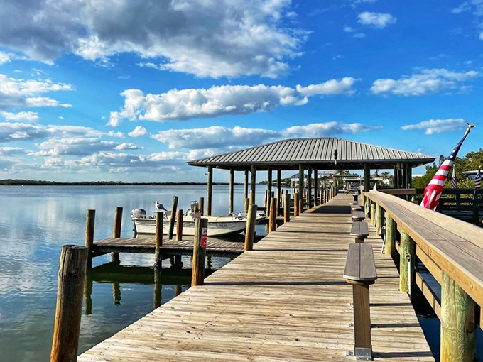 The dock where boats pull up and appetites dock in. Mother Nature showing off with that sky is just a bonus.