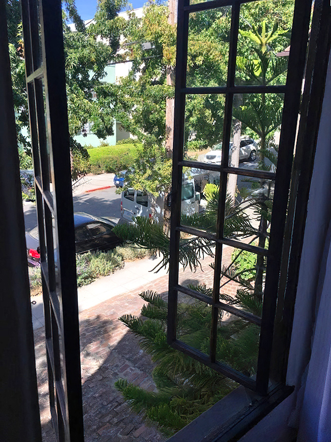 Windows frame garden views that make even the most dedicated city dweller consider suburban life.