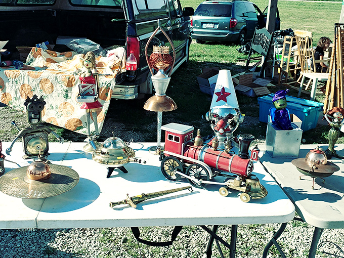 Vintage treasures await new stories on this tabletop time machine where miniature trains and lamps spark nostalgia for childhoods long past.