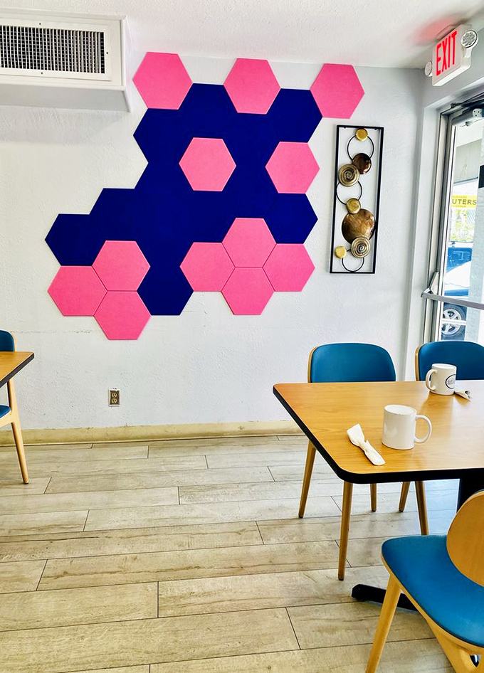 Modern meets retro with this eye-catching geometric wall display in La Croisette's signature pink and blue color scheme.