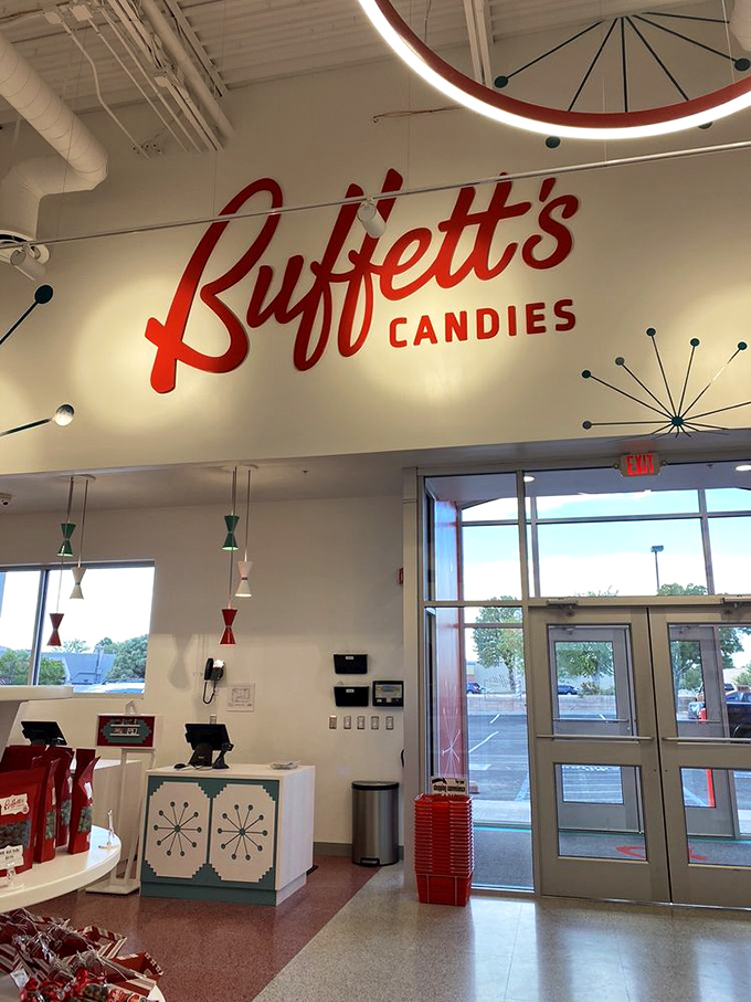 Southwestern design elements meet candy shop aesthetics in this wall display. The gift cards promise access to a world of sweetness.