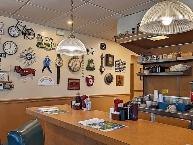 The wall of clocks isn't just decoration &ndash; it's the restaurant's beating heart. Each timepiece tells a story, much like the regulars who gather beneath them.