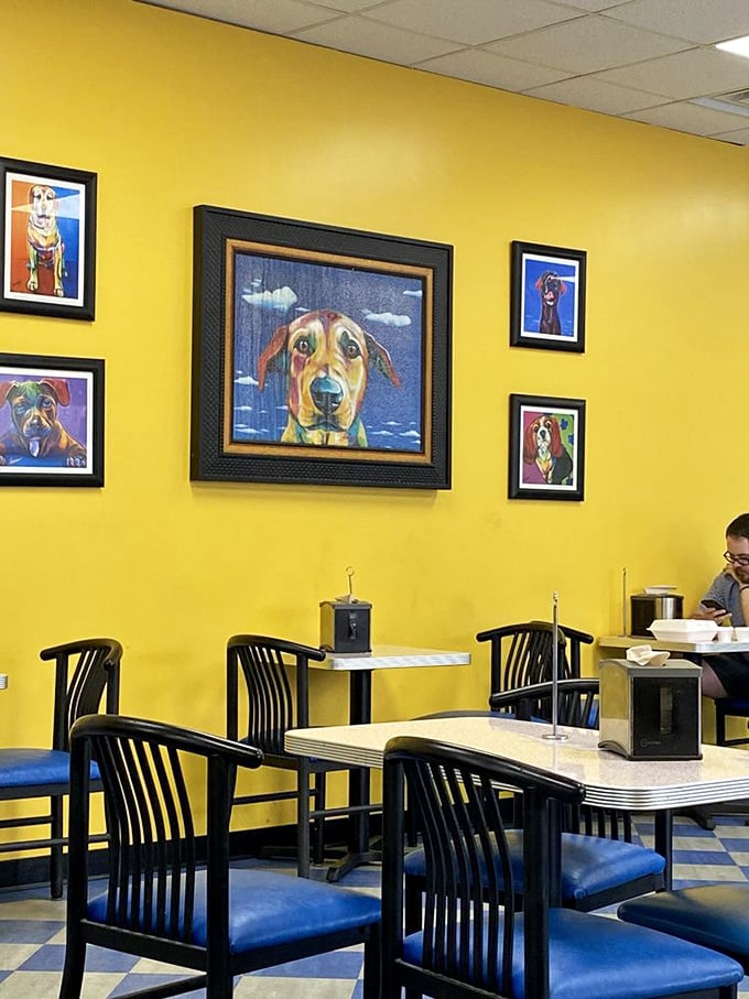 The colorful dog portraits watching over diners add whimsy to your meal. Even they seem to be eyeing your biscuits with envy.