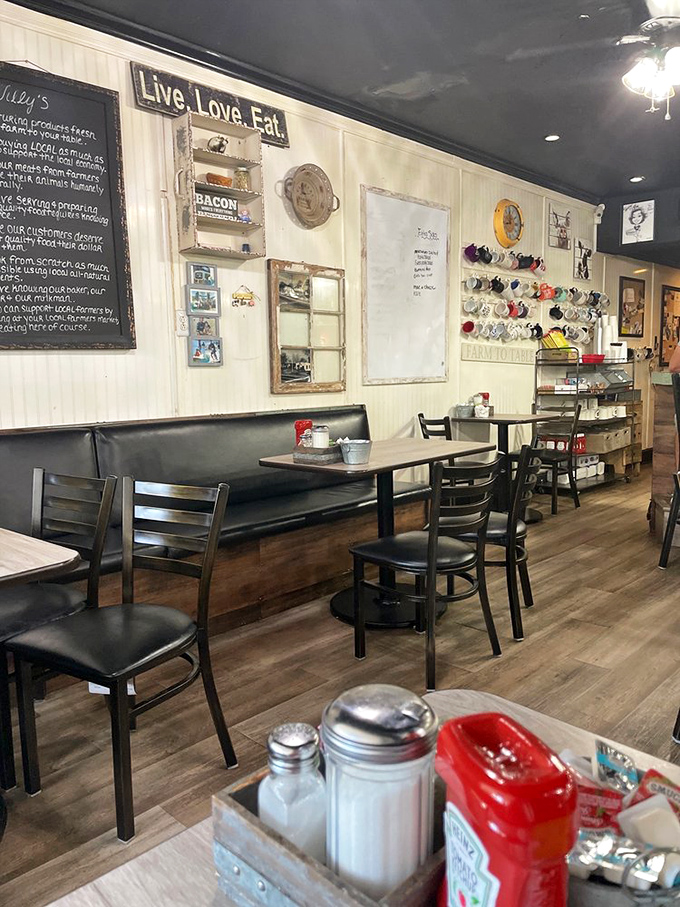 The "Live. Love. Eat." sign isn't just decor&mdash;it's the restaurant's philosophy in three simple words. The collection of mugs tells stories of countless morning coffees.