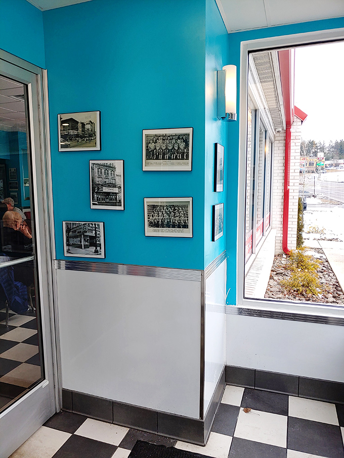 Black and white photos on turquoise walls tell Pottsville stories while you create your own over coffee and home fries.