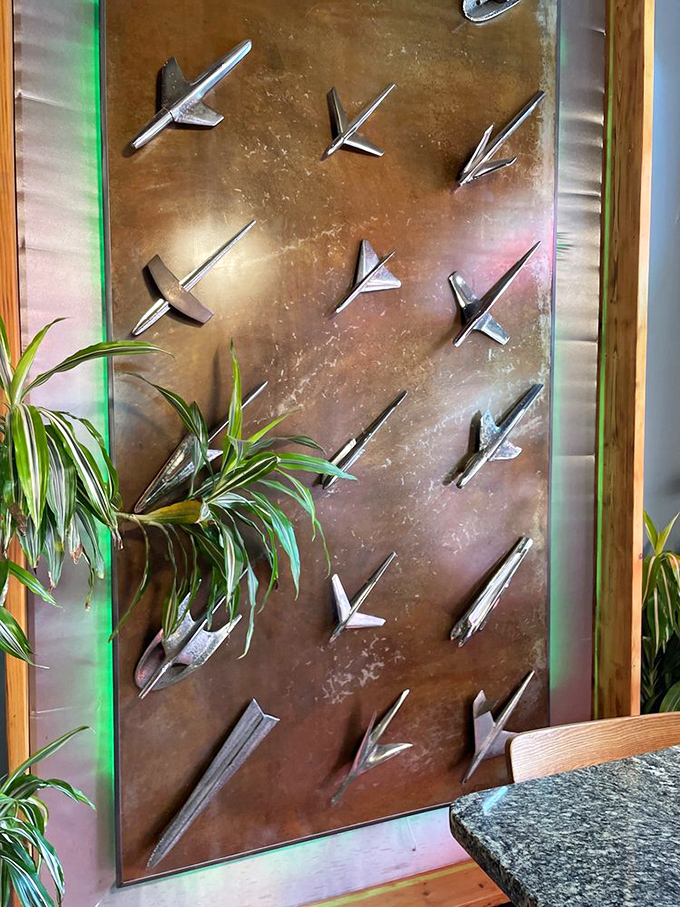 Aviation meets art in this wall installation of metallic planes&mdash;a nod to New Mexico's big skies and the journeys that bring hungry travelers to Range Cafe.