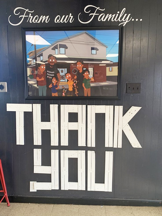 The wall of fame showcases community pride while the "From our Family..." sign reminds you this isn't just a restaurant—it's someone's passion project.