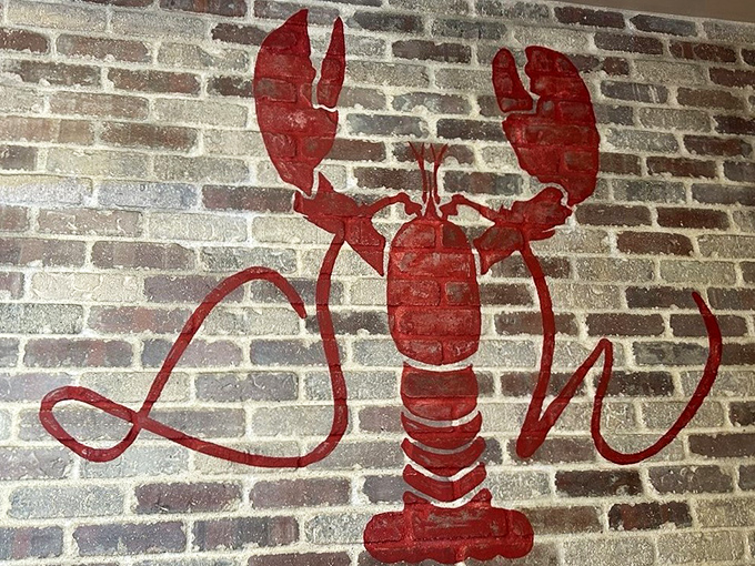 That bold red lobster on exposed brick isn't just d&eacute;cor&mdash;it's a promise. Like finding Banksy art in a seafood joint, it signals you've discovered something special.