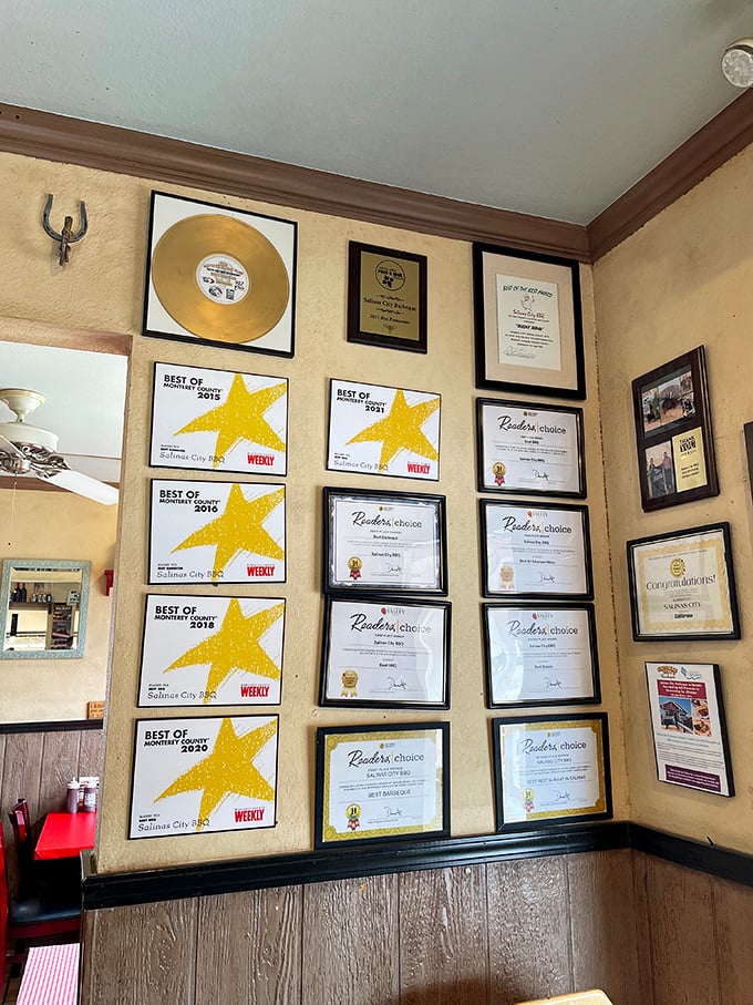 The wall that tells the story without saying a word. Years of "Best Of" awards and accolades frame the restaurant's journey from local secret to destination dining.