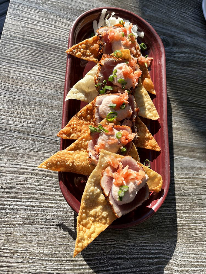 Seared ahi on crispy wonton chips—the perfect marriage of Hawaii and Asia that proves some of the best relationships are cross-cultural.