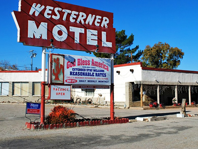 The Westerner Motel's classic sign stands as a roadside beacon of hospitality, promising weary travelers a genuine slice of Americana with their room key.