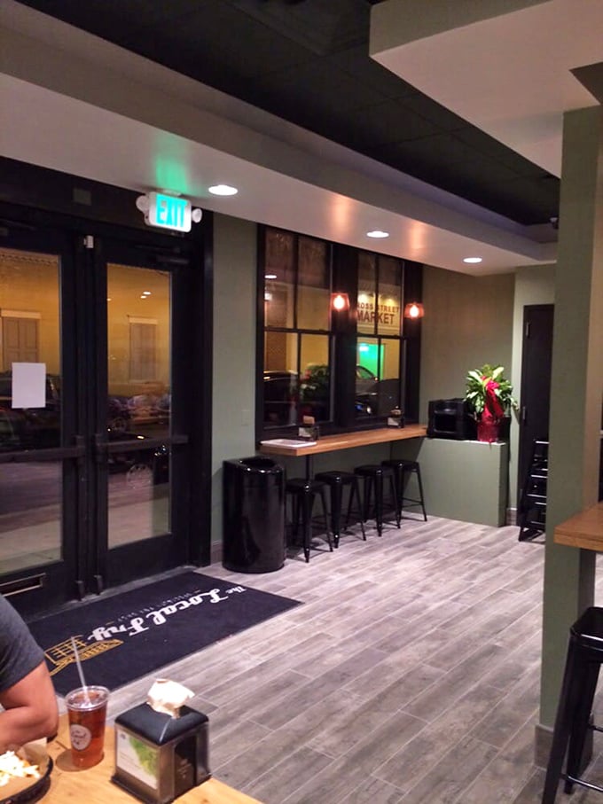 The evening ambiance adds a touch of urban cool to your fry experience. Those window seats are prime real estate for people-watching between bites.