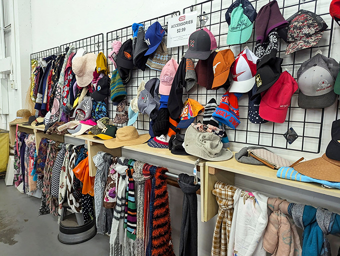 The accessory wall transforms seasonal protection into fashion statements. That striped scarf is practically begging for a new neck.