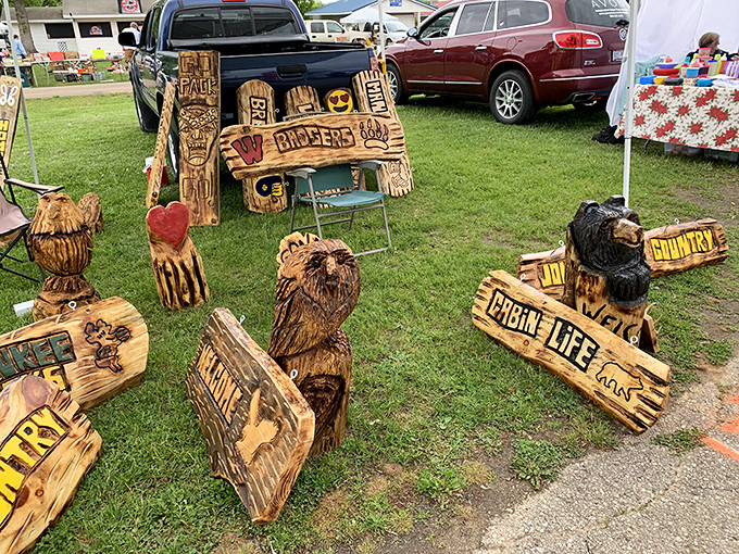 Hand-carved wooden bears and signs remind us when yard art meant something made by actual hands.