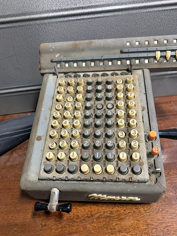 This vintage adding machine calculated business transactions long before Excel spreadsheets. Mechanical mathematics with personality and presence.