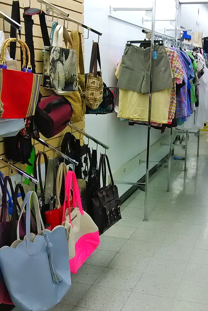 Handbag heaven! Designer lookalikes mingle with authentic vintage finds in this accessories cornucopia. That blue tote is practically winking at me.