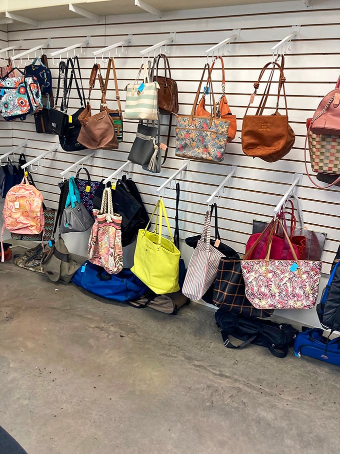 Handbag heaven for the accessory enthusiast&mdash;a rainbow of leather, canvas, and possibilities hanging in patient formation.