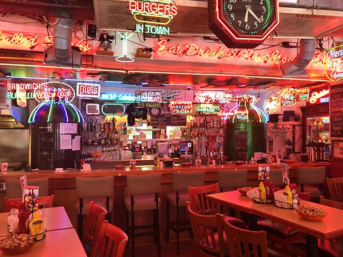 Where beer meets burger in perfect harmony. The bar's neon collection could power a small city, but instead, it powers good times.