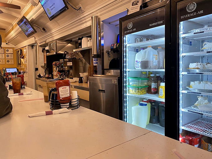 The open kitchen design isn't for show &ndash; it's a transparent contract between cook and customer that says, "Watch me make something worth remembering."