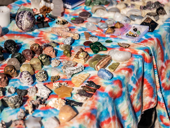Nature's artwork displayed on a tie-dye canvas—these carved crystals and mineral specimens are geological treasures for the taking.