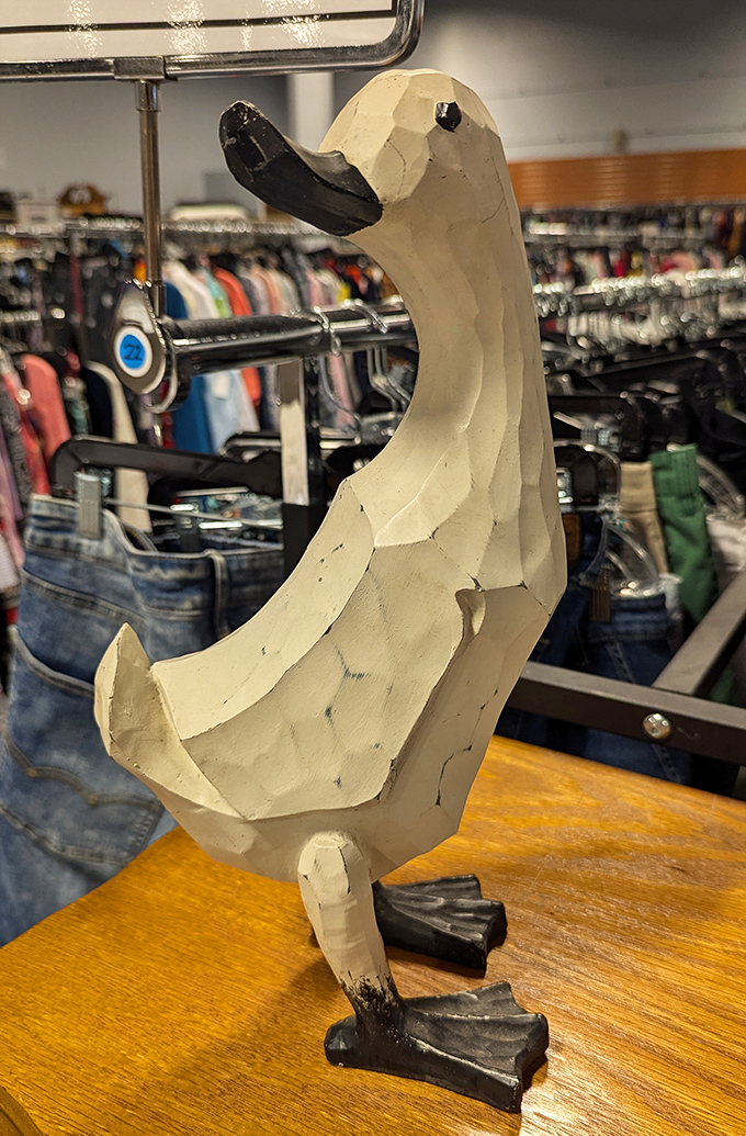 This wooden duck has seen things. With its stoic expression and geometric charm, it's the perfect guardian for your bookshelf.