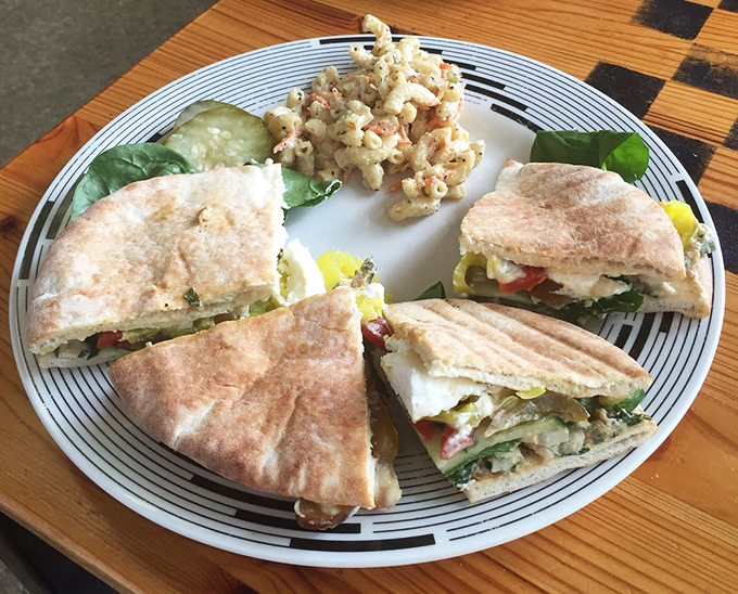 Pita perfection quartered for maximum enjoyment. The kind of sandwich that makes you wonder why you ever ate anything else.