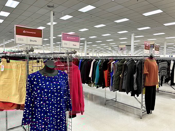 Color-coded clothing racks make finding your size and style surprisingly efficient&mdash;no digging required in this secondhand fashion department.