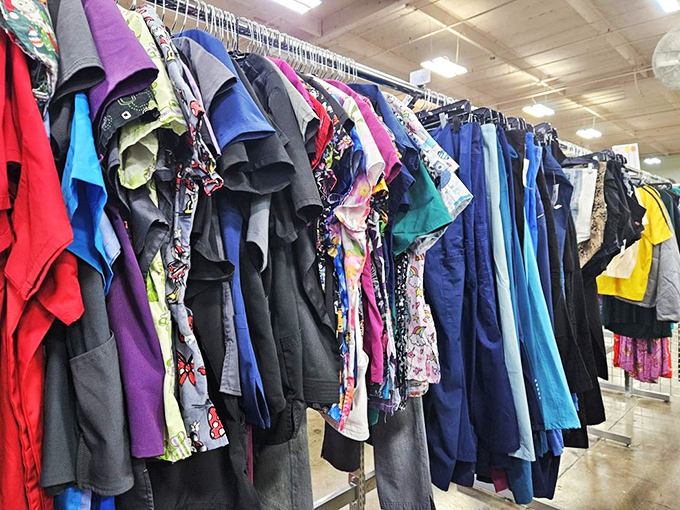 Clothing racks burst with fashion possibilities where one person's closet cleanout becomes another's style revolution.