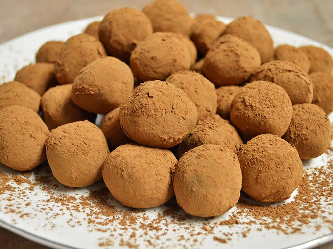 Cocoa-dusted truffles lounging like royalty. These powdery spheres of chocolate perfection are the aristocrats of the candy counter&mdash;sophisticated yet approachable.