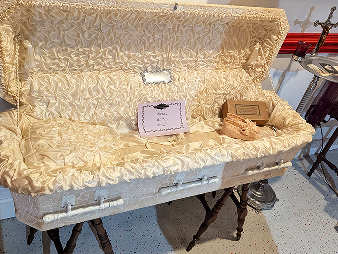 This cream-colored coffin with its satin interior reminds us that comfort and aesthetics mattered even when the recipient could no longer express appreciation.