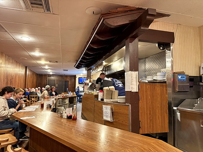 At this counter, life slows down just enough to appreciate what matters: good food, friendly service, and the theater of short-order cooking.