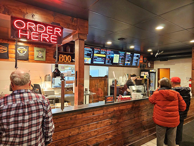 The ordering counter, where dreams come true and decisions get tough. That "Order Here" sign might as well say "Happiness Starts Here."
