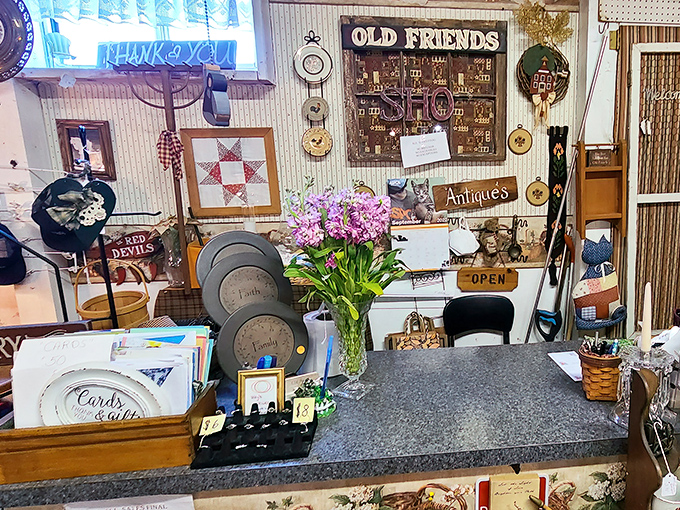 A vendor's counter blooms with personality and carefully arranged wares&mdash;that "Old Friends" sign perfectly captures the feeling of finding your collecting community.