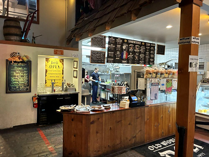 Where sandwich magic happens &ndash; the wooden counter and blackboard menu create that perfect blend of rustic charm and culinary anticipation.